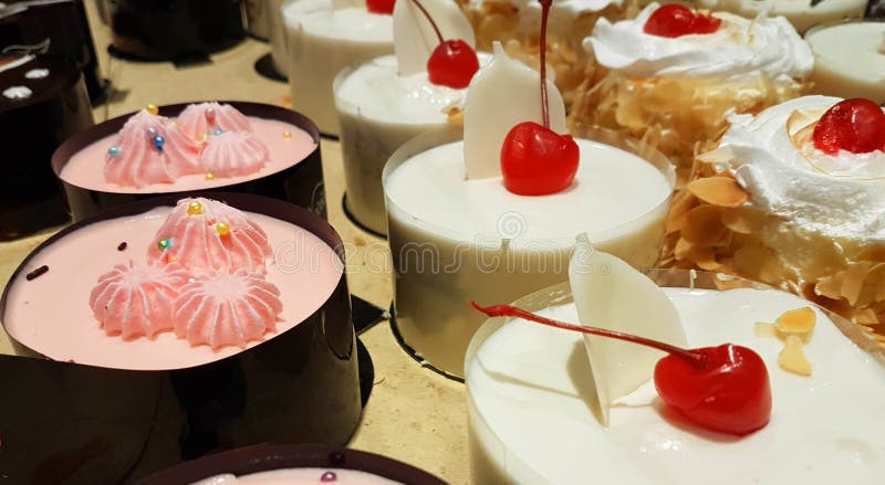 Swees with Cherry on Top in Greek Pastry Shop Stock Image - Image of ...