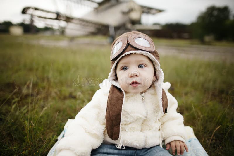 Sweet Baby Dreaming of Being Pilot Stock Photo - Image of baby, fantasy ...
