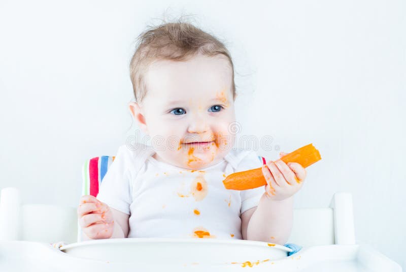 Sweet Baby Eating Her First Carrot Stock Image - Image of caucasian ...
