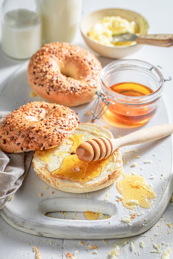 Sweet Bagel with Honey and Butter in the Morning Stock Photo - Image of ...