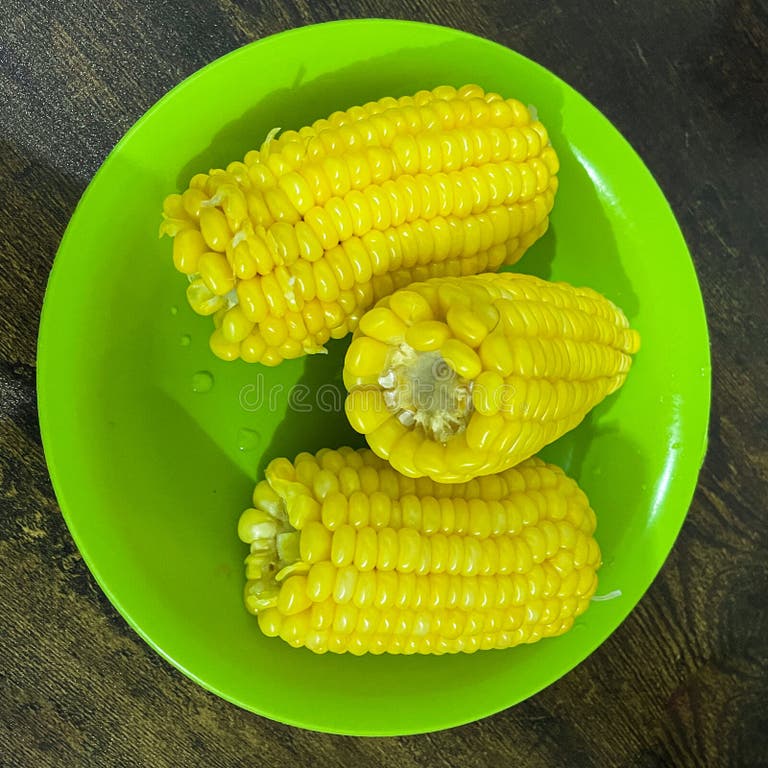 Sweet Boiled Corn Served on Green Plate Stock Image - Image of ...