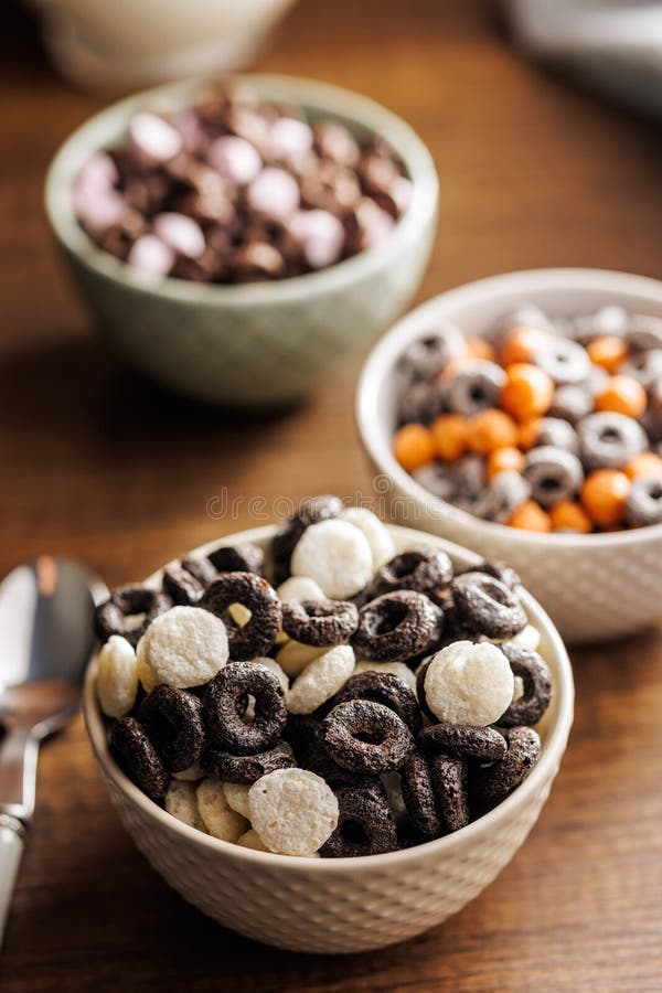 Sweet Breakfast Cereals in Bowl on Kitchen Table Stock Image - Image of ...