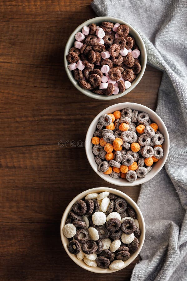 Sweet Breakfast Cereals in Bowl on Kitchen Table. Top View Stock Photo ...