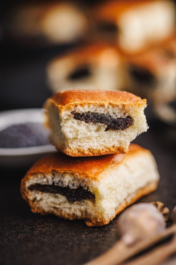 Sweet Bun with Poppy Seed on Black Table Stock Photo - Image of baked ...