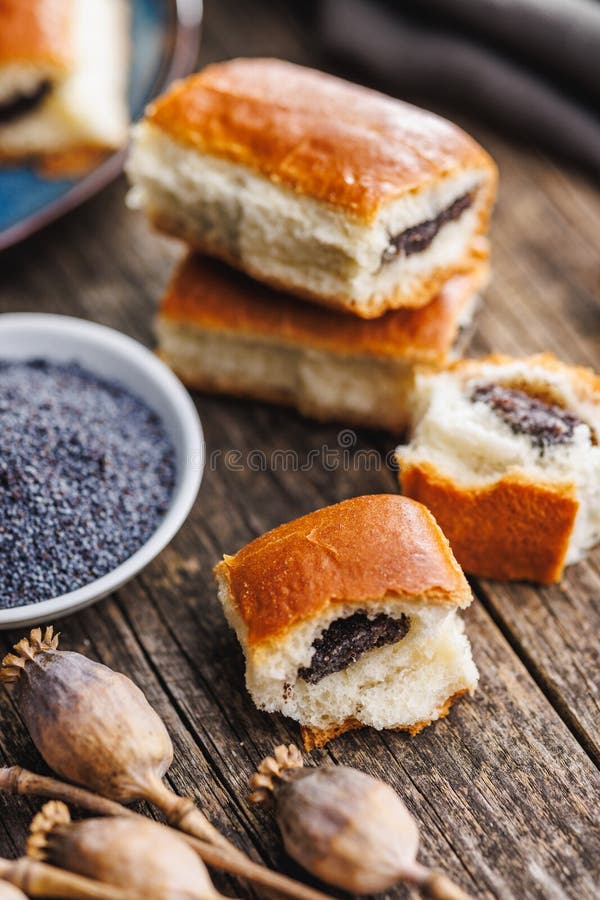 Sweet Bun with Poppy Seed on Wooden Table Stock Photo - Image of food ...