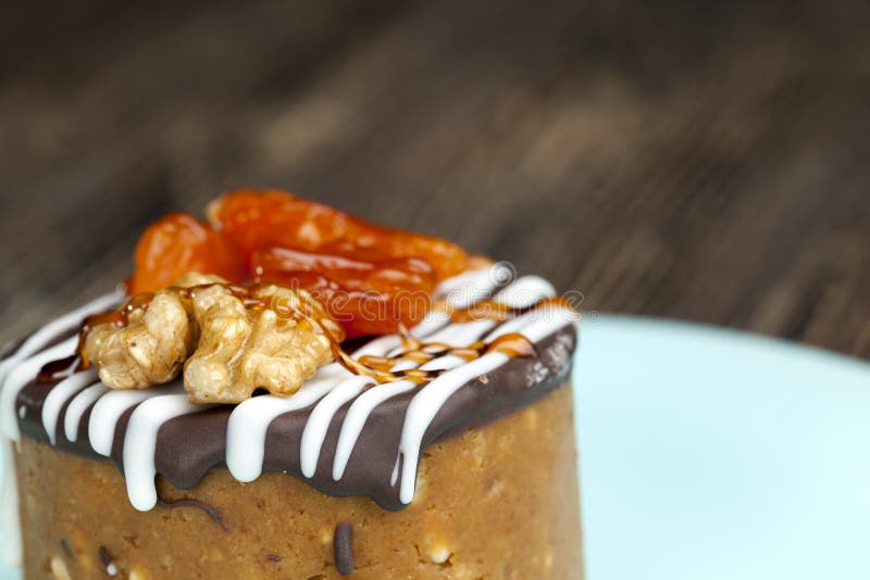 Sweet Cake in the Shape of a Cylinder Stock Photo - Image of peanuts ...