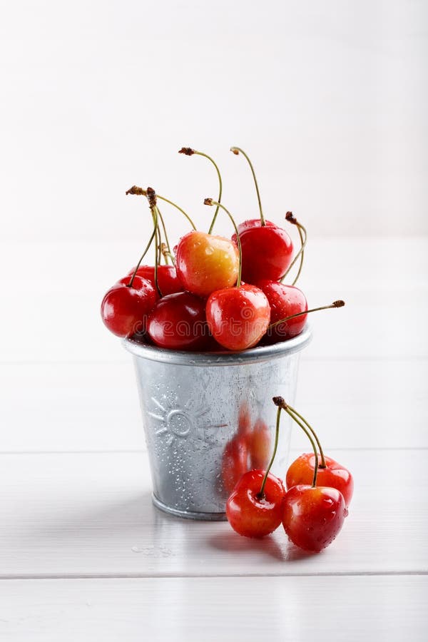 Sweet Cherry in a Small Metal Bucket on White Stock Photo - Image of ...