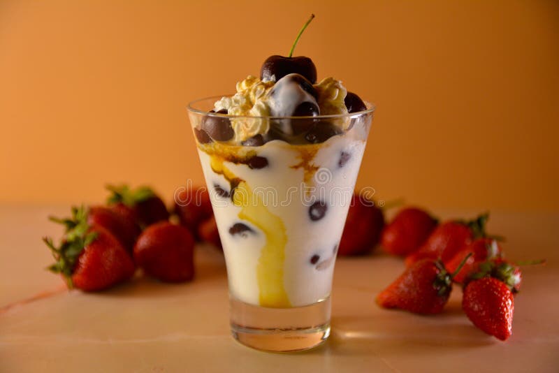 Sweet Cocktail with Cream on Orange Background Stock Image - Image of ...