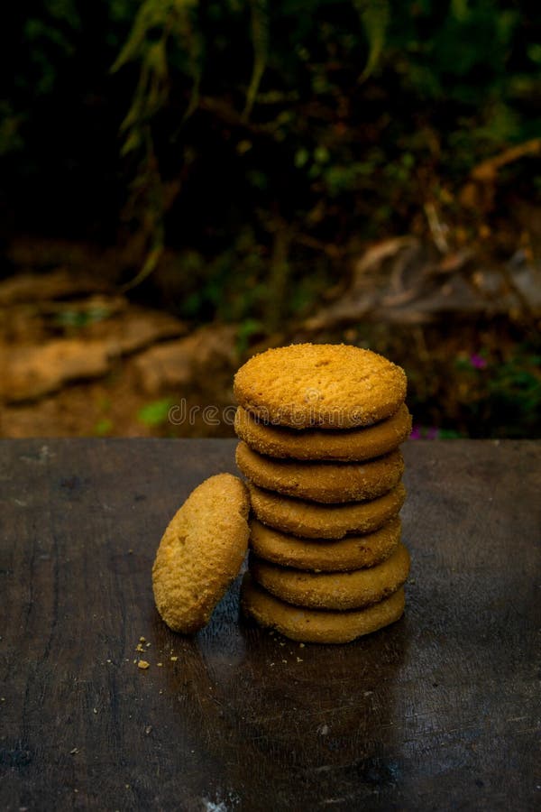 Sweet Cookies Stacked Together on a Table Stock Photo - Image of brown ...