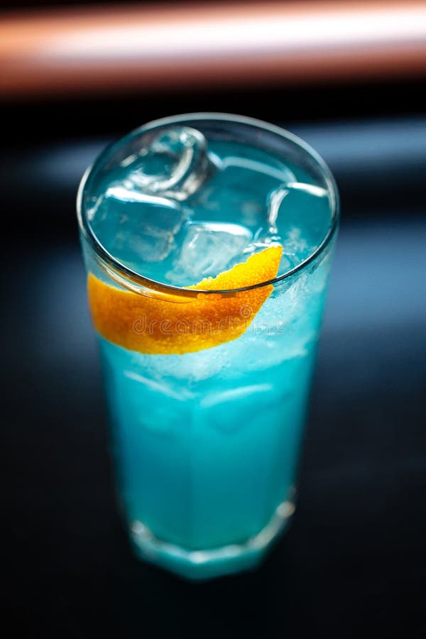 Sweet Cool Blue Cocktail with Lemon and Ice Stock Image - Image of ...