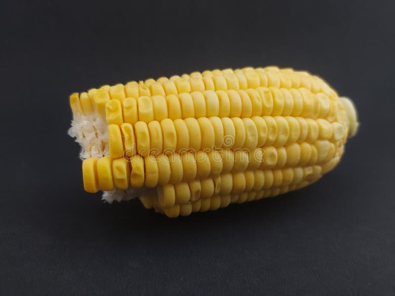 Sweet Corn Chunks on Black Background Stock Photo - Image of orange ...