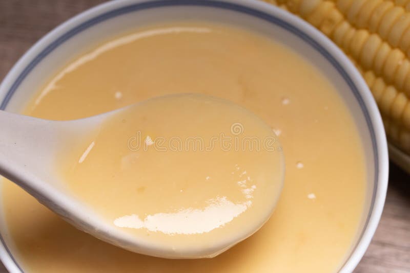 Sweet Corn Soup in a Ceramic Cup on Wooden Background.copy Space Stock ...