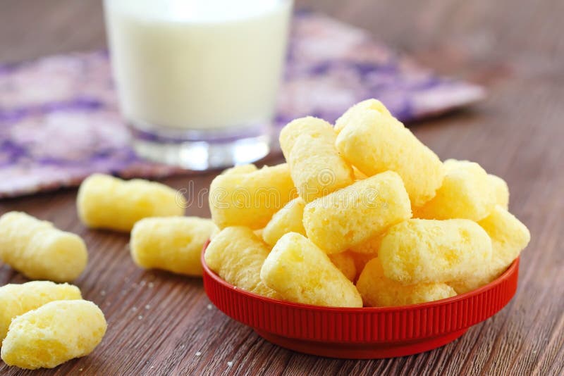 Sweet Corn Sticks with Sugar Powder and Milk Stock Photo - Image of ...