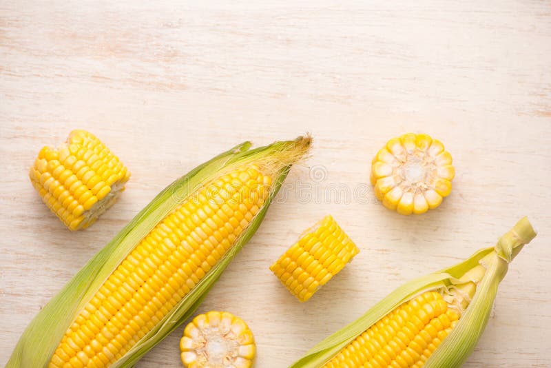 Sweet Corns. Fresh Corn on Cobs on Wooden Table. Stock Image - Image of ...