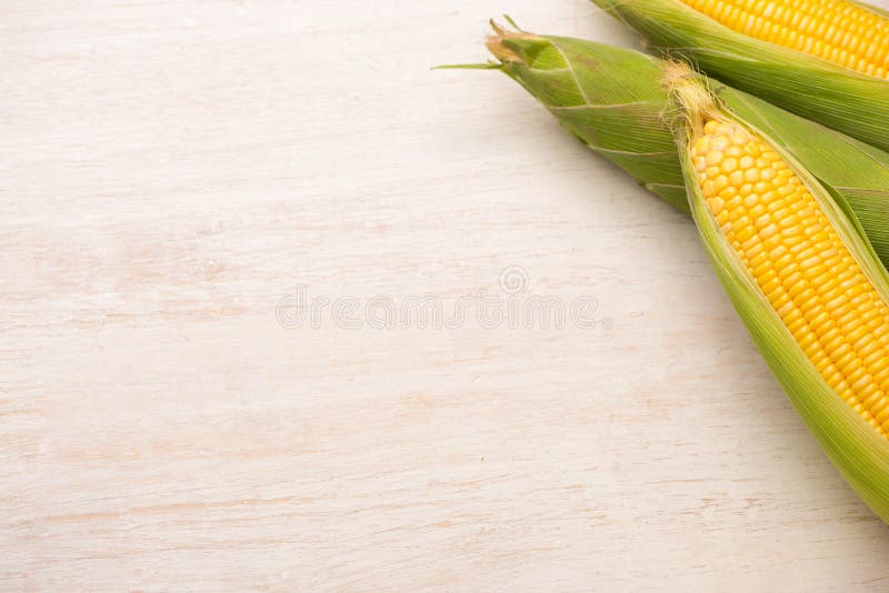 Sweet Corns. Fresh Corn on Cobs on Wooden Table. Stock Image - Image of ...