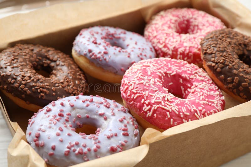 Sweet Delicious Glazed Donuts in Box, Closeup Stock Photo - Image of ...