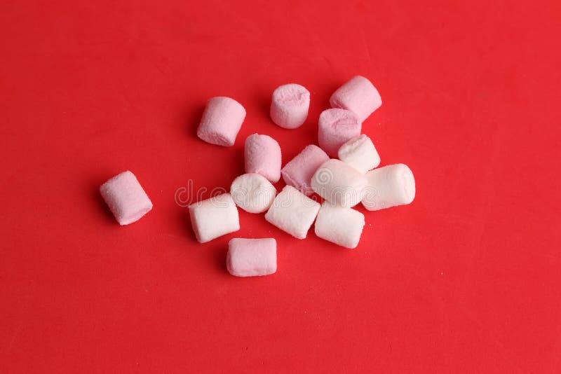 Sweet and Delicious Marshmallows on the Red Surface Stock Image - Image ...