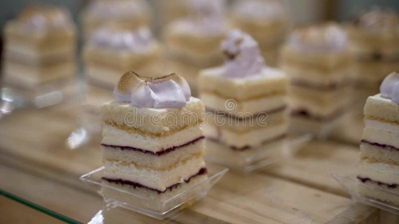 Sweet Dessert at the Buffet. Assorted Different Mini Cakes with Cream ...