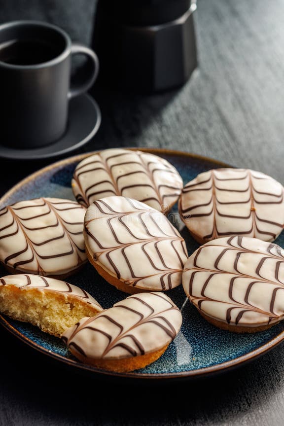 Sweet Dessert with Sugar Coating on Plate on Black Table Stock Image ...