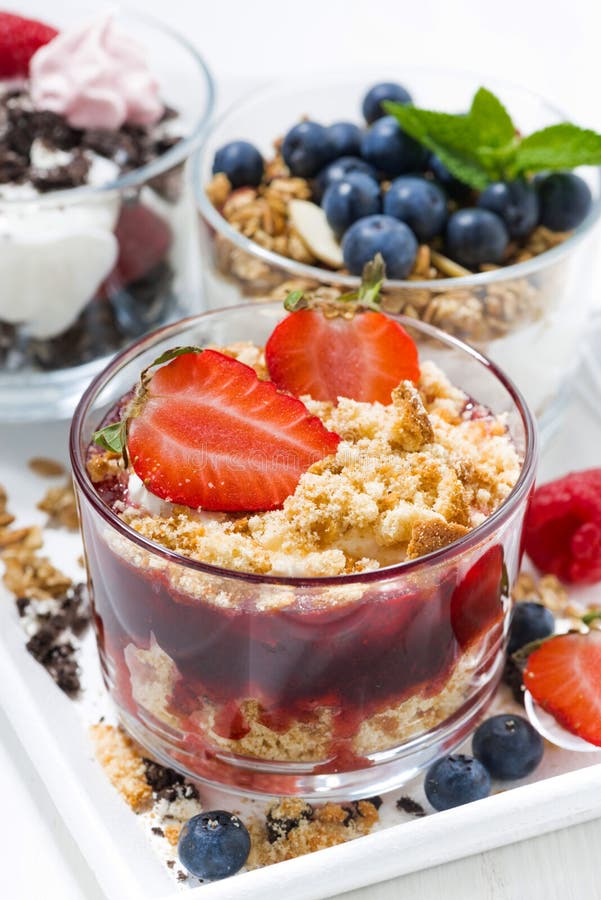 Sweet Desserts with Fresh Berries in Glasses on Table Stock Image ...