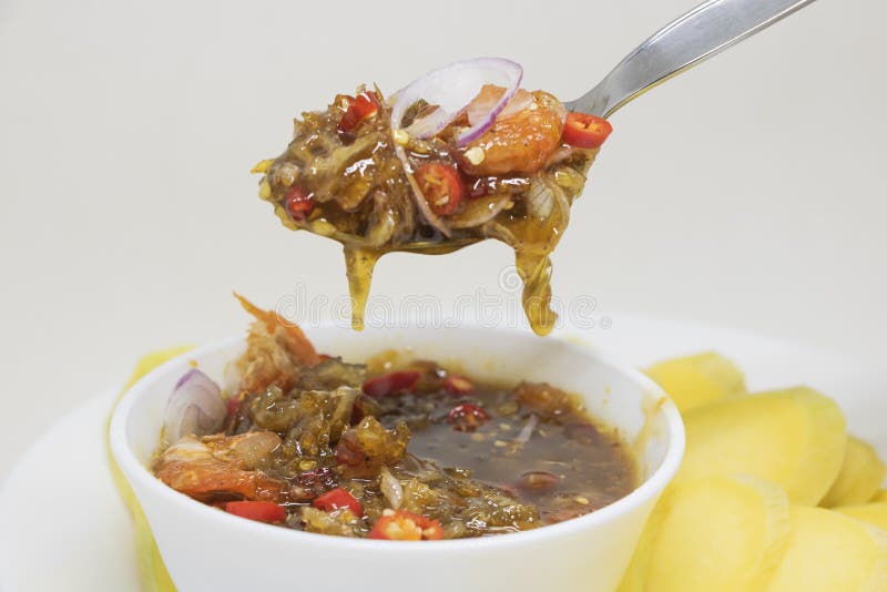 Sweet Fish Sauce and Mango in a White Cup on a White Background Stock ...