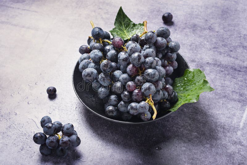 Sweet Fresh Black Grape on the Dark Table Stock Image - Image of ...