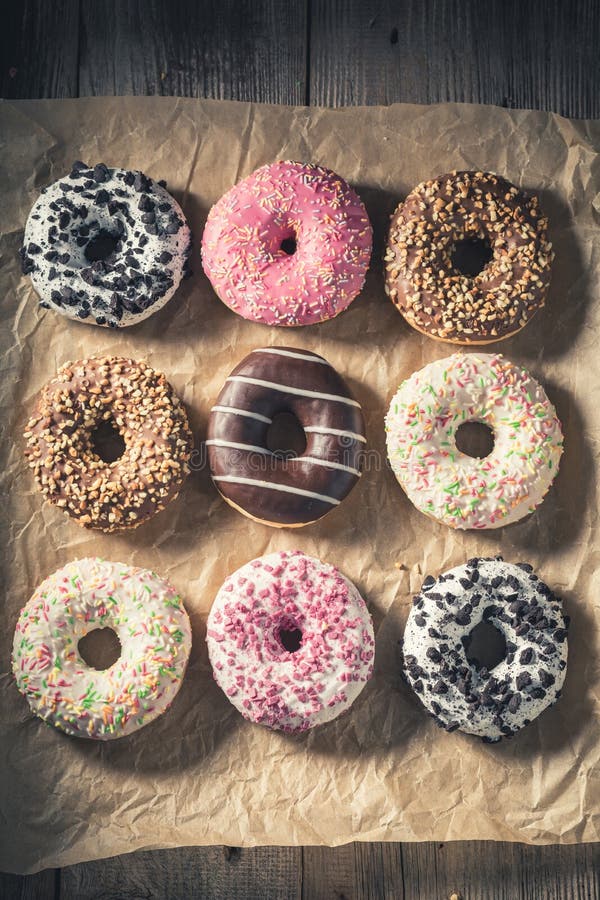Sweet and Fresh Donuts on Baking Paper Stock Image - Image of food ...