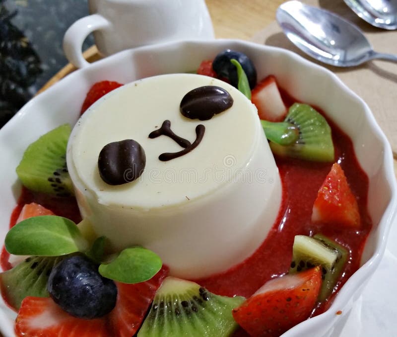 Sweet Fruity Syrup and the Panda Face Pudding. Stock Image - Image of ...