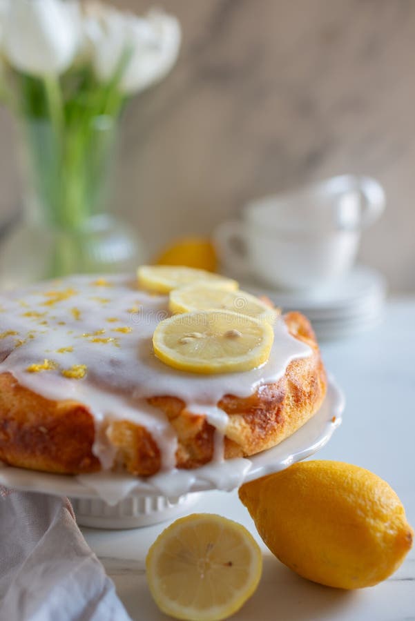 Yellow Lemon Cake with Icing Stock Image - Image of blue, fruit: 319075541