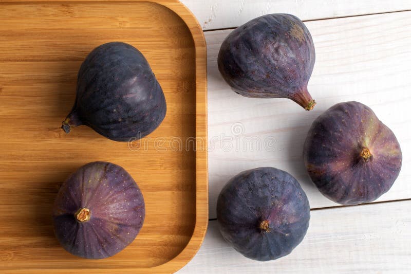 Sweet Juicy Figs with Kitchen Utensils Isolated on White, Black ...