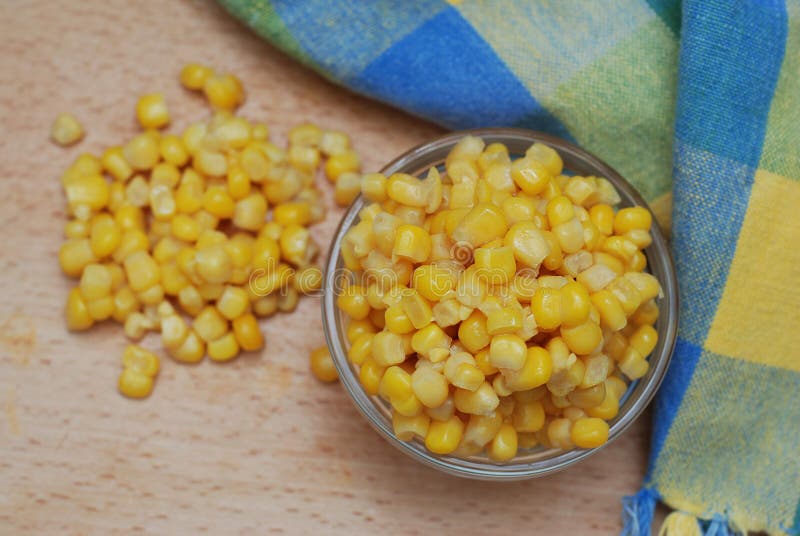 Sweet Kernel Corn in Glass Bowl with Blue Napkin Stock Photo - Image of ...