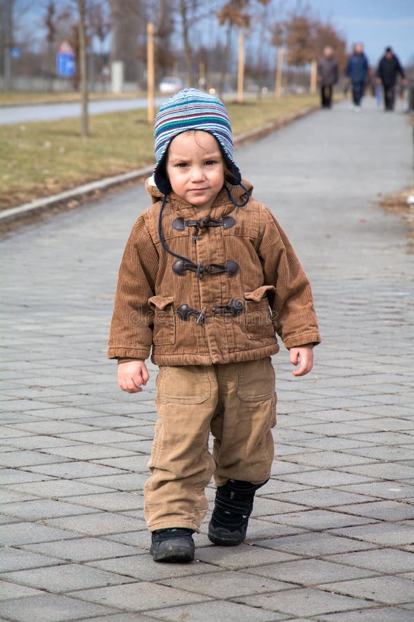 Sweet Little Boy on the Street Stock Photo - Image of color, children ...