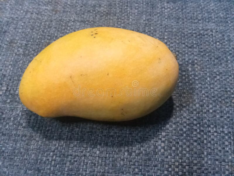 Sweet mango on the table stock image. Image of orange - 202227209