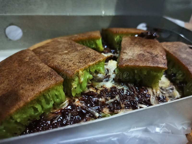 Sweet Martabak. The Martabak Batter Which Is Being Cooked On A Frying ...