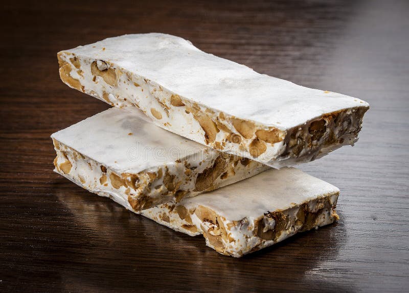 Nougat with Nuts on Parchment Stock Image - Image of cooking, pieces ...