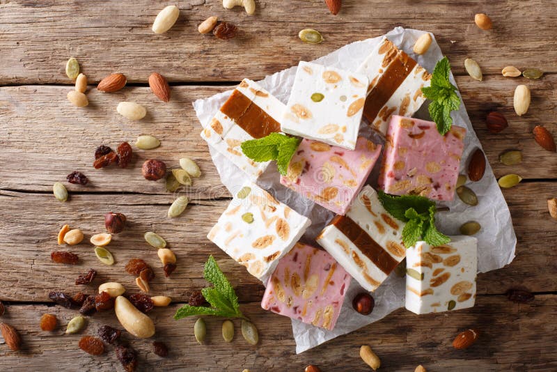 Sweet Nougat with Nuts, Decorated with Mint Closeup on the Table Stock ...