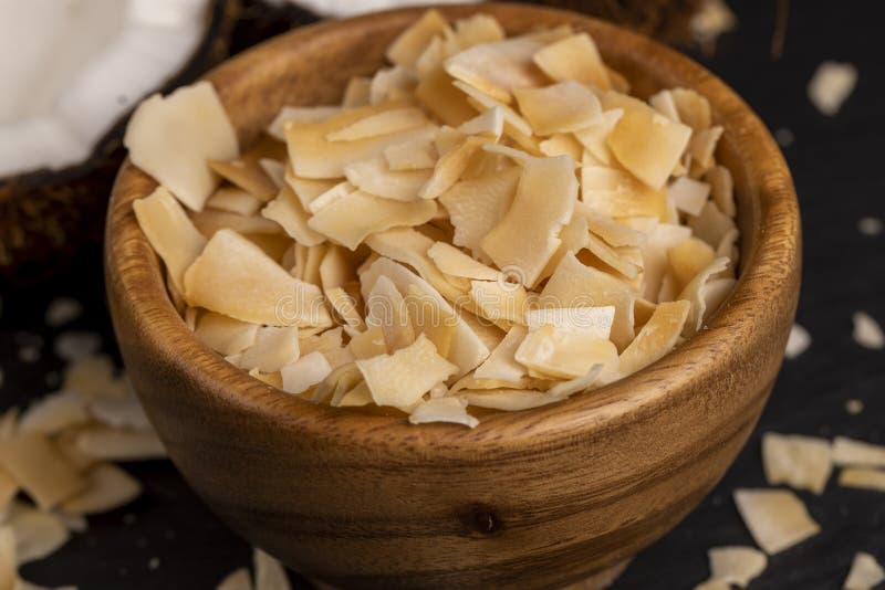 Sweet Orange and Yellow Coconut Flakes Fried in Sugar Stock Image ...