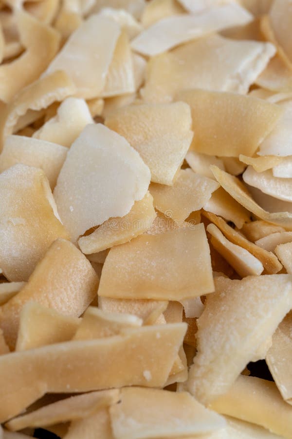 Sweet Orange and Yellow Coconut Flakes Fried in Sugar Stock Image ...