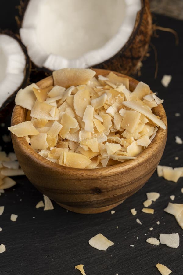 Sweet Orange and Yellow Coconut Flakes Fried in Sugar Stock Image ...