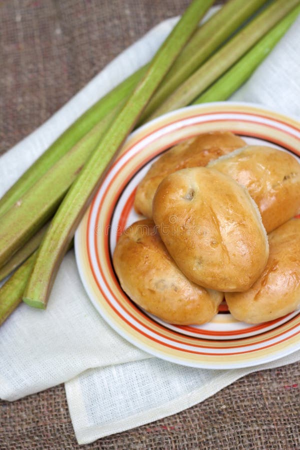 Sweet patties with rhubarb stock image. Image of season - 41539809