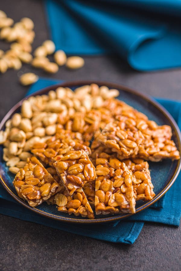 Sweet Peanut Brittle. Tasty Peanuts in Caramel on Plate Stock Image ...