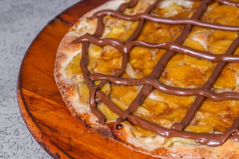 Sweet Pizza with Banana, Sweet Sigh and Cinnamon. Traditional Brazilian ...