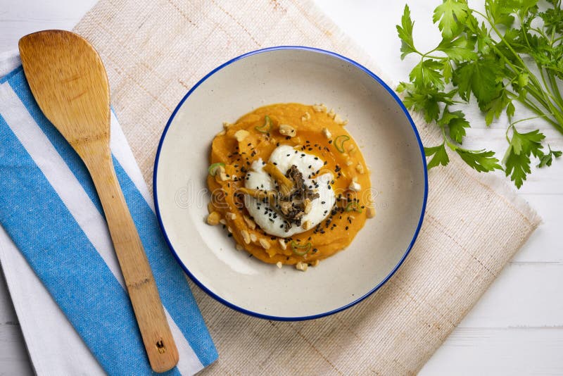 Sweet Potato Cream with Poached Egg and Mushrooms. Top View Table Stock ...