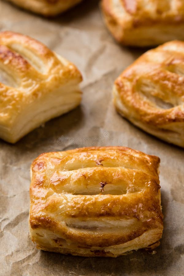 Sweet puff pastry on paper stock photo. Image of bakery - 60938714