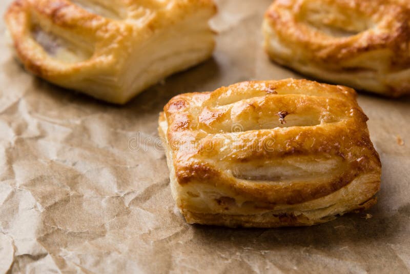 Sweet puff pastry on paper stock photo. Image of healthy - 60941680