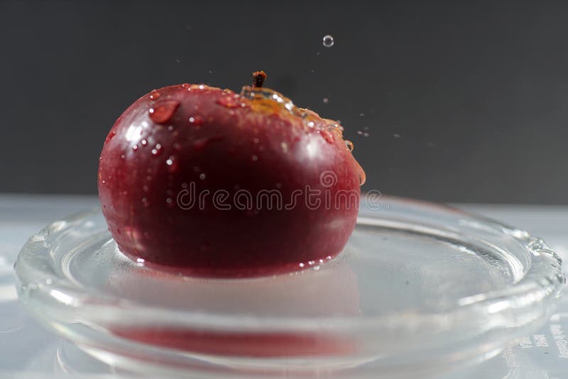 Sweet Red Apple in the Bowl Filled with Water Stock Image - Image of ...