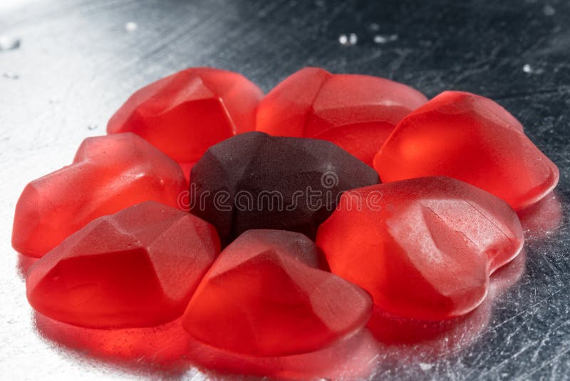 Sweet Red Gummies in the Shape of a Heart, on a Light Background Stock ...