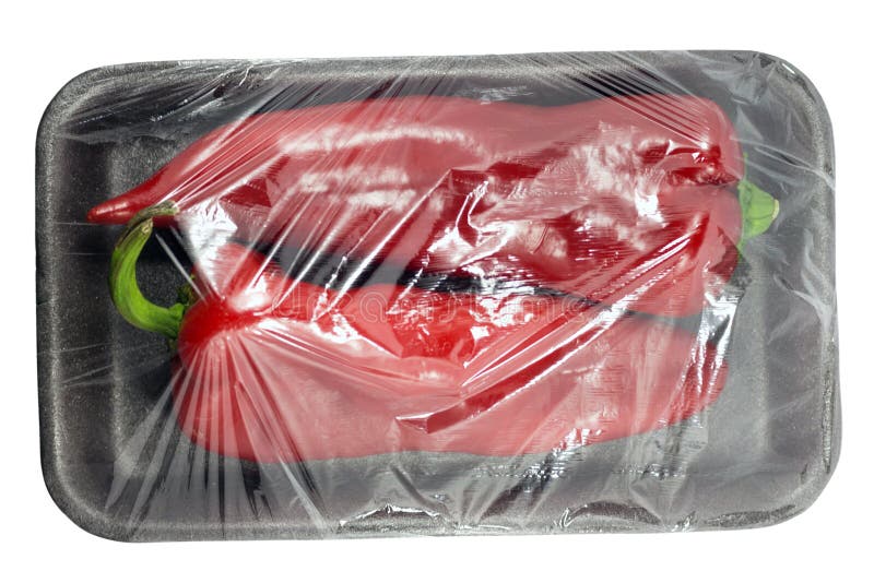 Sweet Red Pepper in the Plastic Package Isolated on a White Background ...