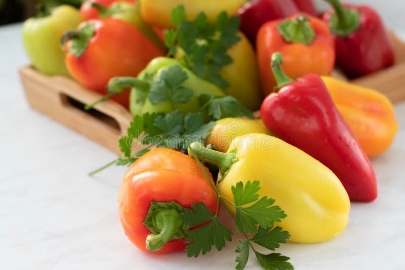 Sweet Red Pepper in a Wooden Tray on a White Table Stock Photo - Image ...