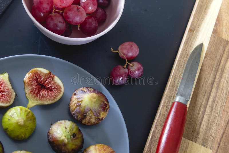Fresh figs and red grapes stock image. Image of fresh - 184905333